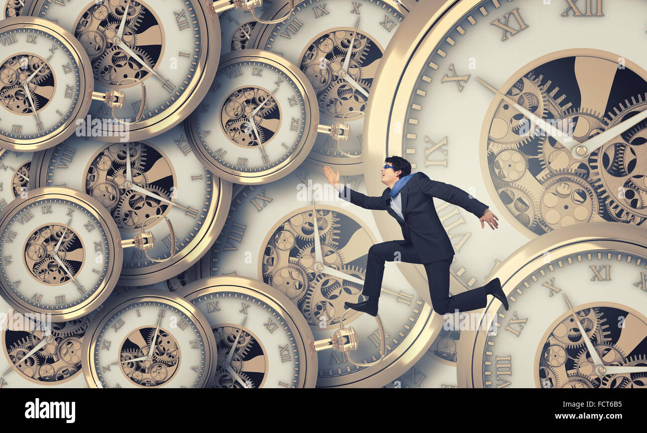 Concept of time with funny businessman running in a hurry Stock Photo ...