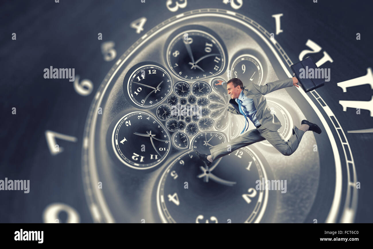 Concept of time with funny businessman running in a hurry Stock Photo ...