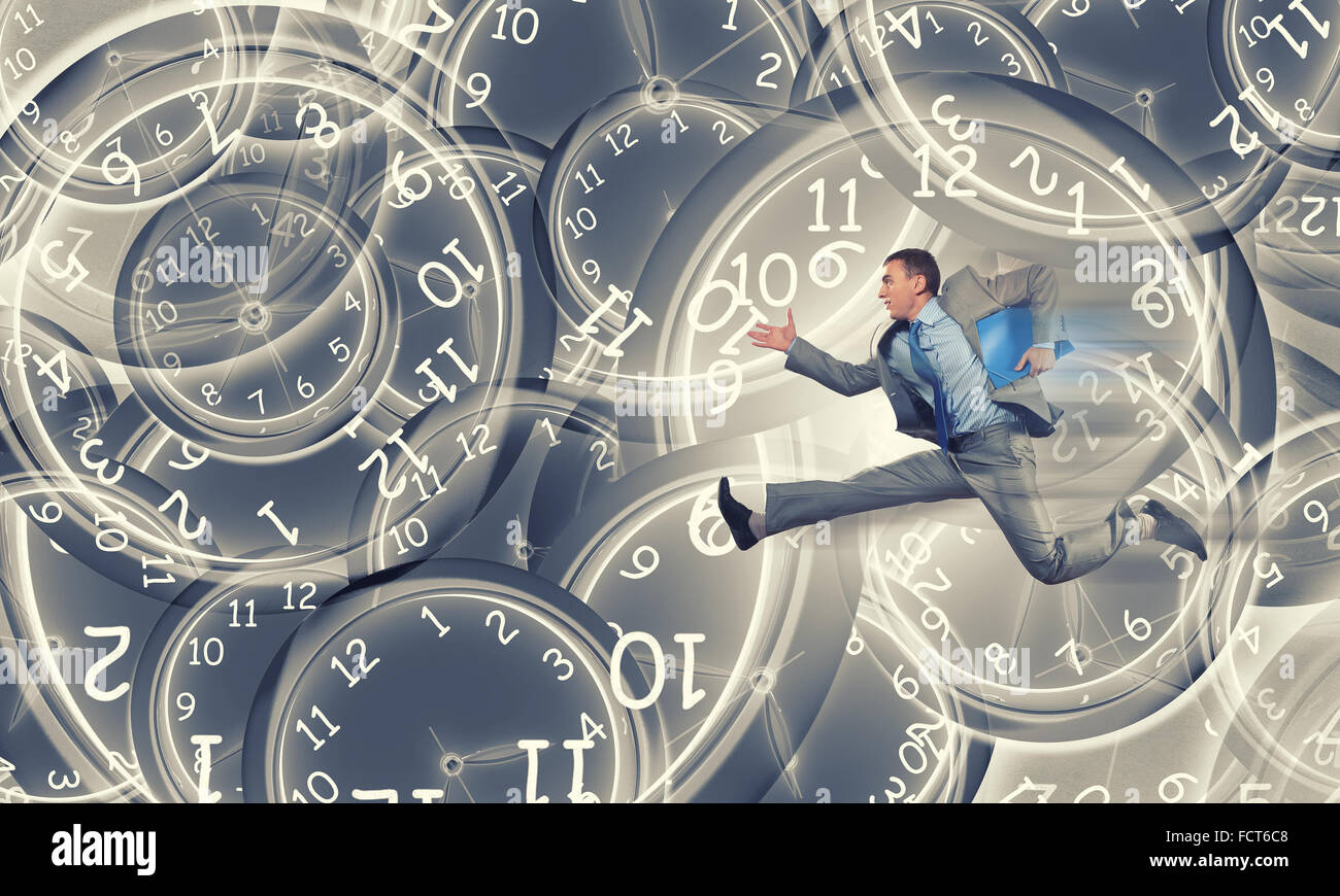 Concept of time with funny businessman running in a hurry Stock Photo ...