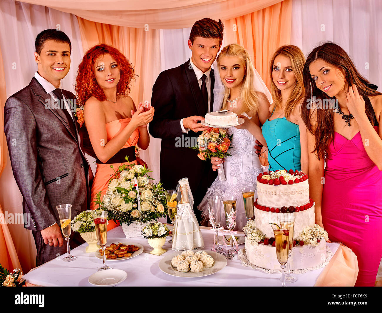 Group people at wedding table Stock Photo - Alamy
