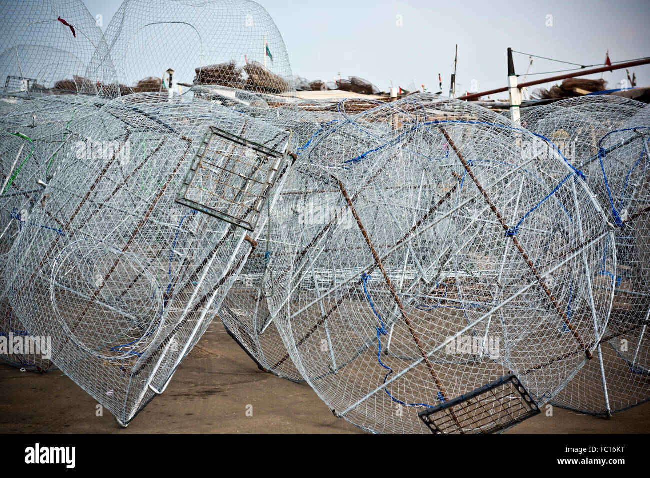 Metal fishing nets in a port. Horizontal shot Stock Photo - Alamy