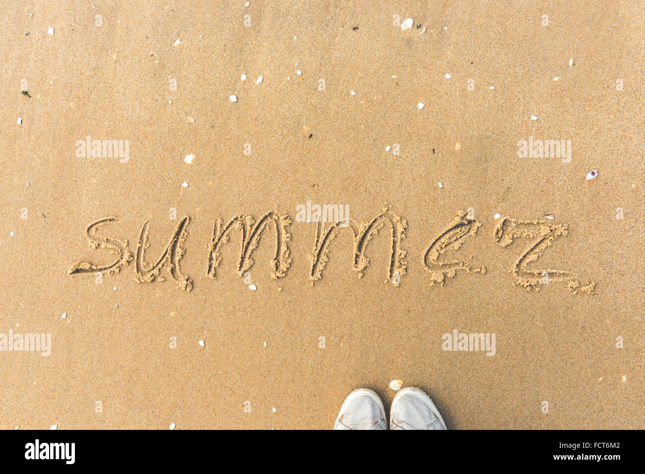 Summer written on the beach. sand background Stock Photo - Alamy