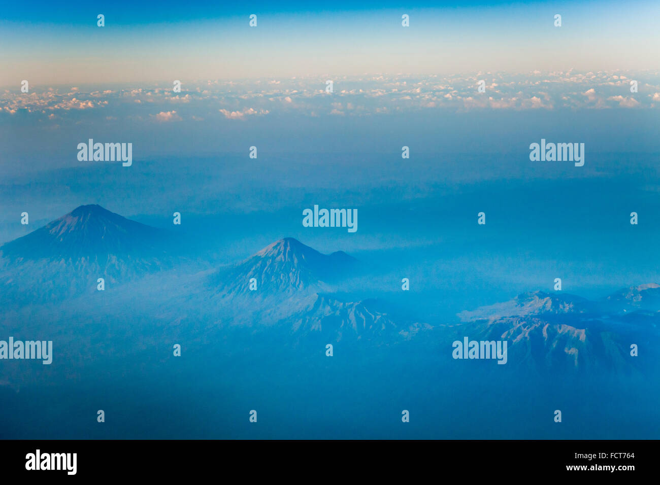 Aerial view of Mount Sumbing, Sundoro, and Dieng Plateau in Central ...