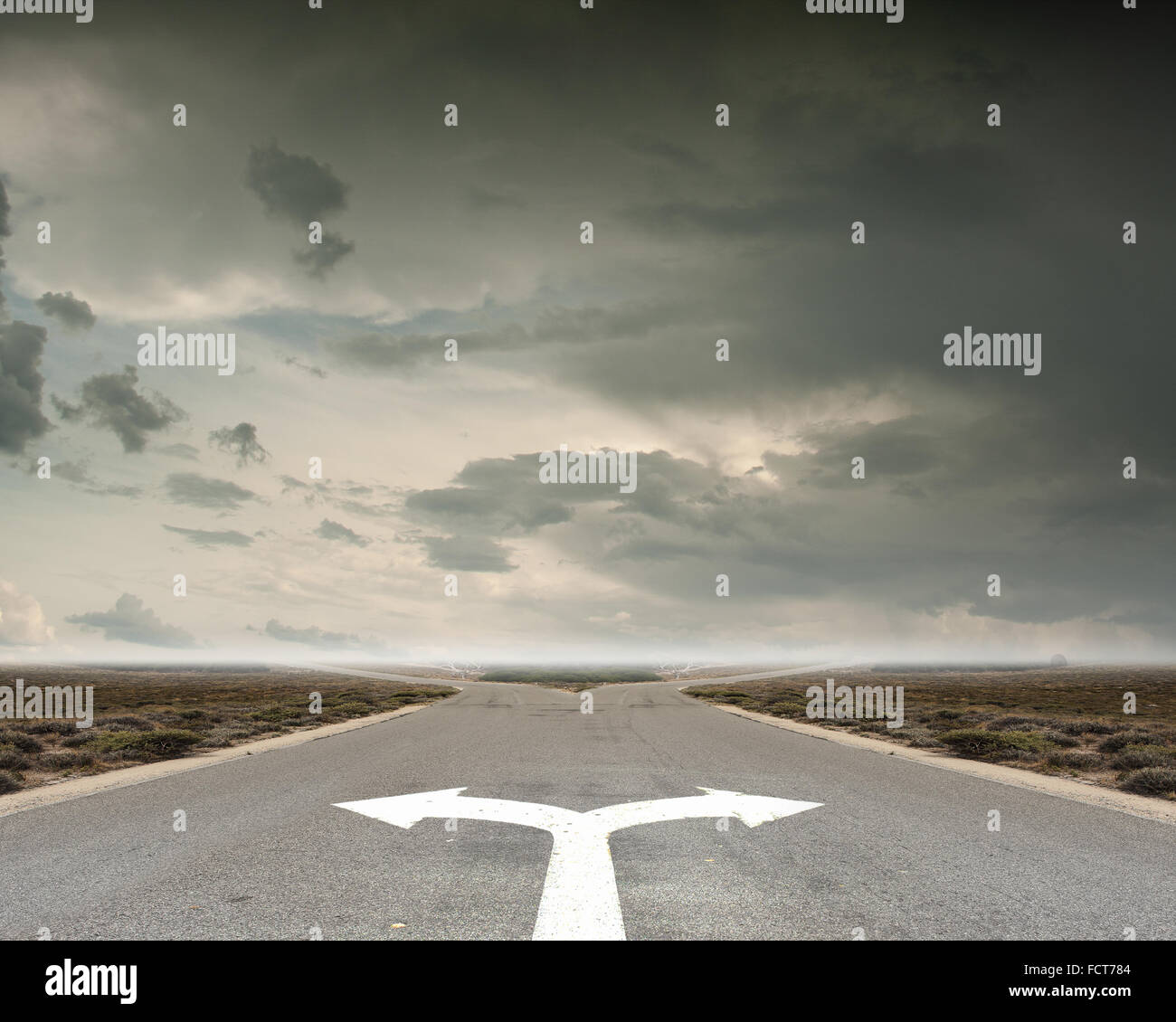 Concept of choice with crossroads spliting in two ways Stock Photo - Alamy