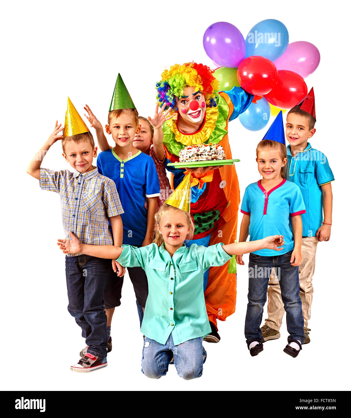 Clown holding cake on birthday with group children Stock Photo - Alamy