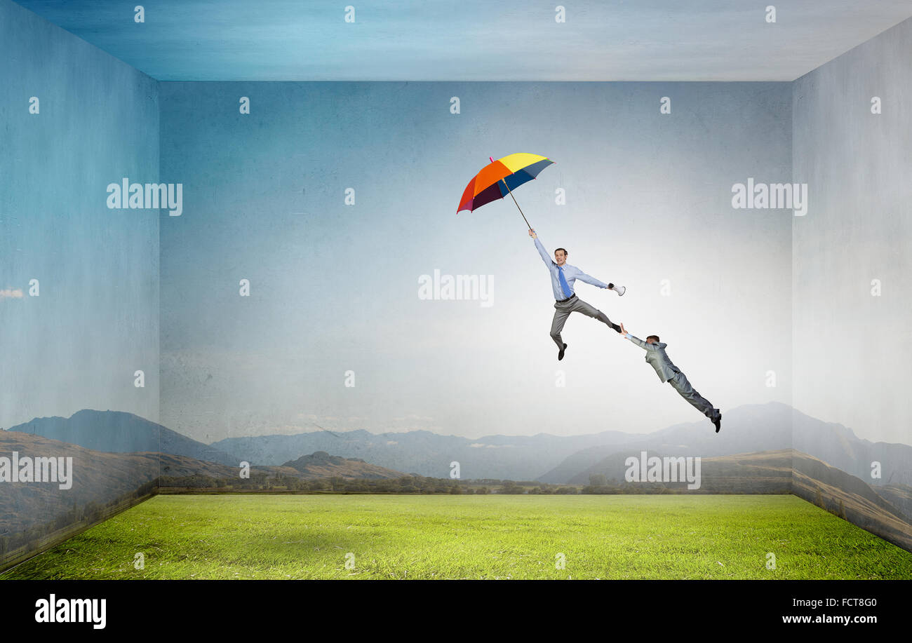 Teamwork achievement catch hi-res stock photography and images - Alamy