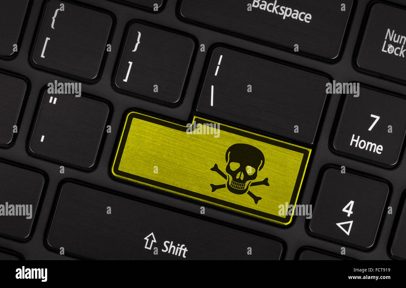 Symbol on button keyboard, warning (yellow) - toxic Stock Photo - Alamy