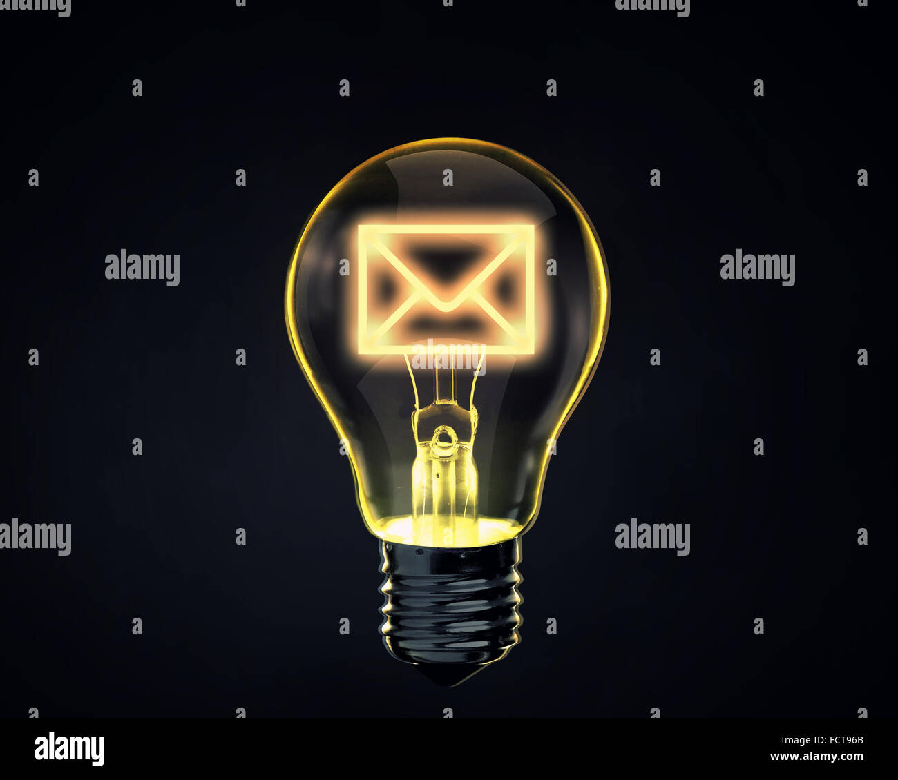 Light bulb with mail sign inside on dark background Stock Photo - Alamy