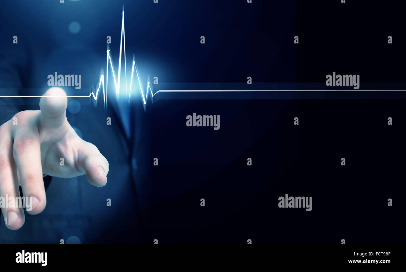 Male hand touch heart pulse on futuristic interface Stock Photo - Alamy