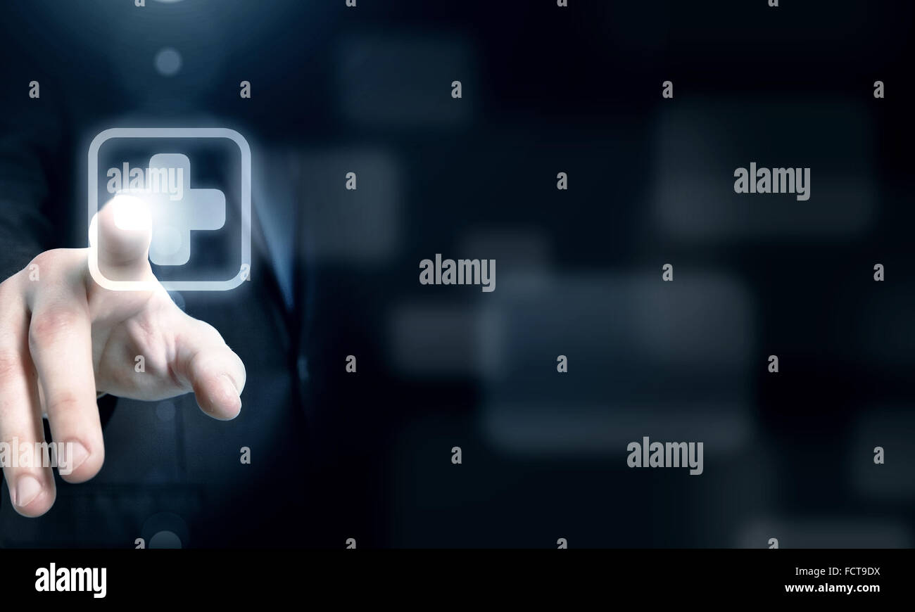 Close up of human hand pushing application icon Stock Photo - Alamy