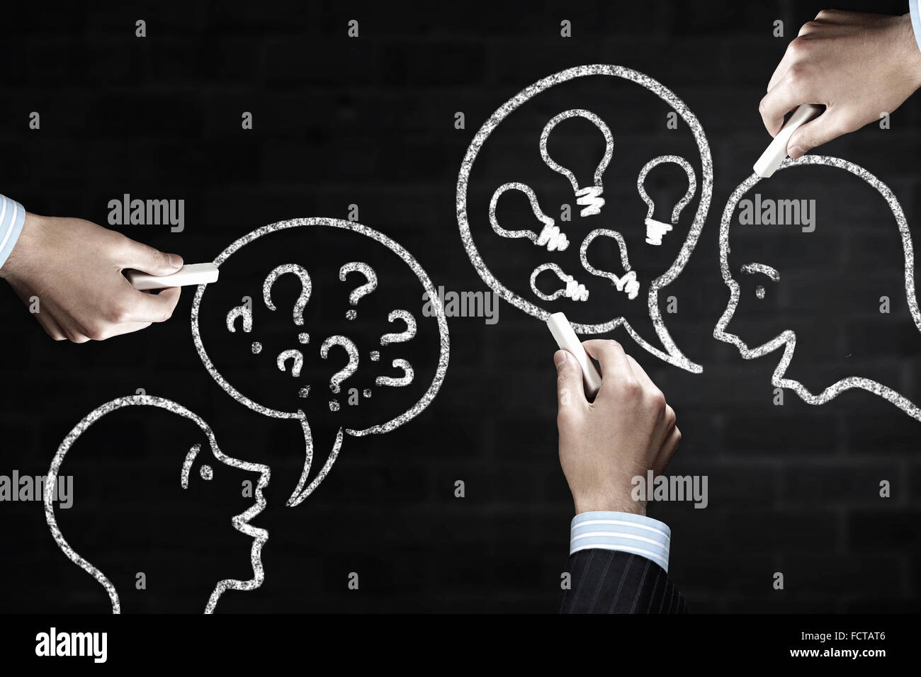 Close up of hand drawing dialogue between two on black wall Stock Photo ...