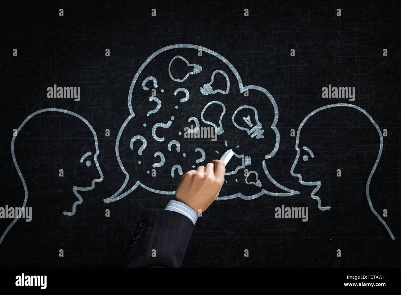 Close up of hand drawing dialogue between two on black wall Stock Photo ...