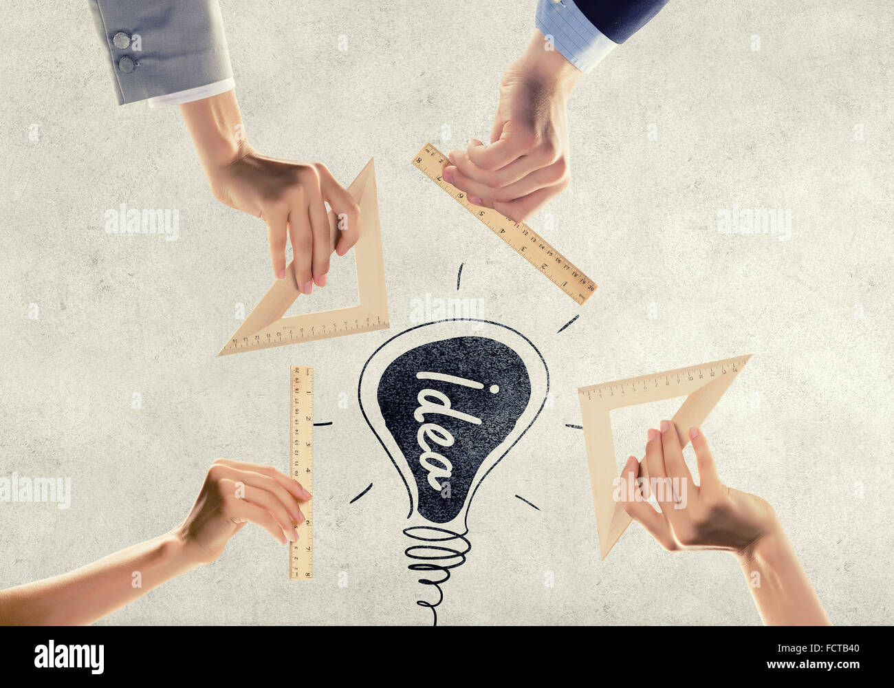 Close up of people hands measuring ight bulb with ruler Stock Photo - Alamy