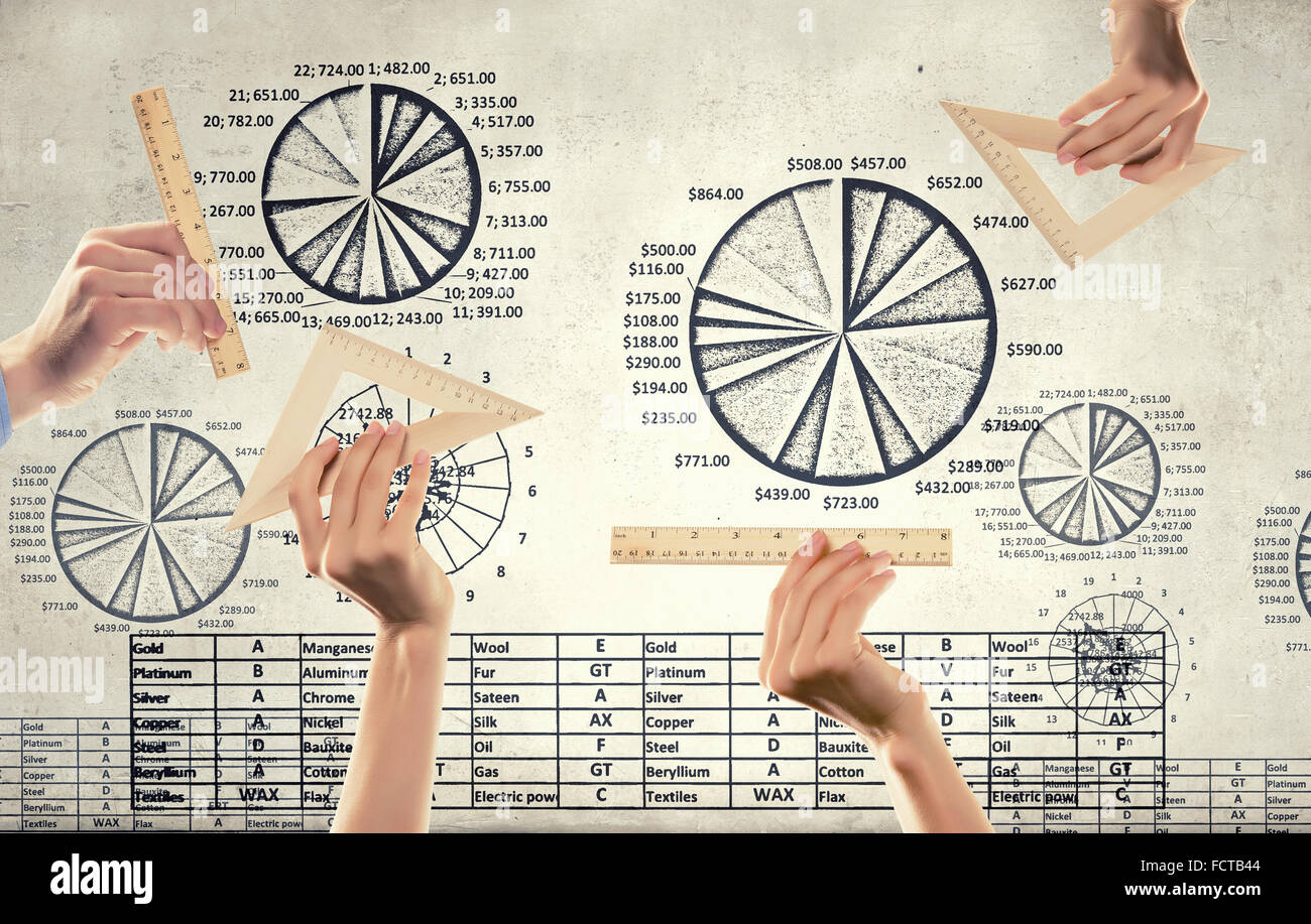 Close up of hand measuring diagrams with ruler Stock Photo - Alamy