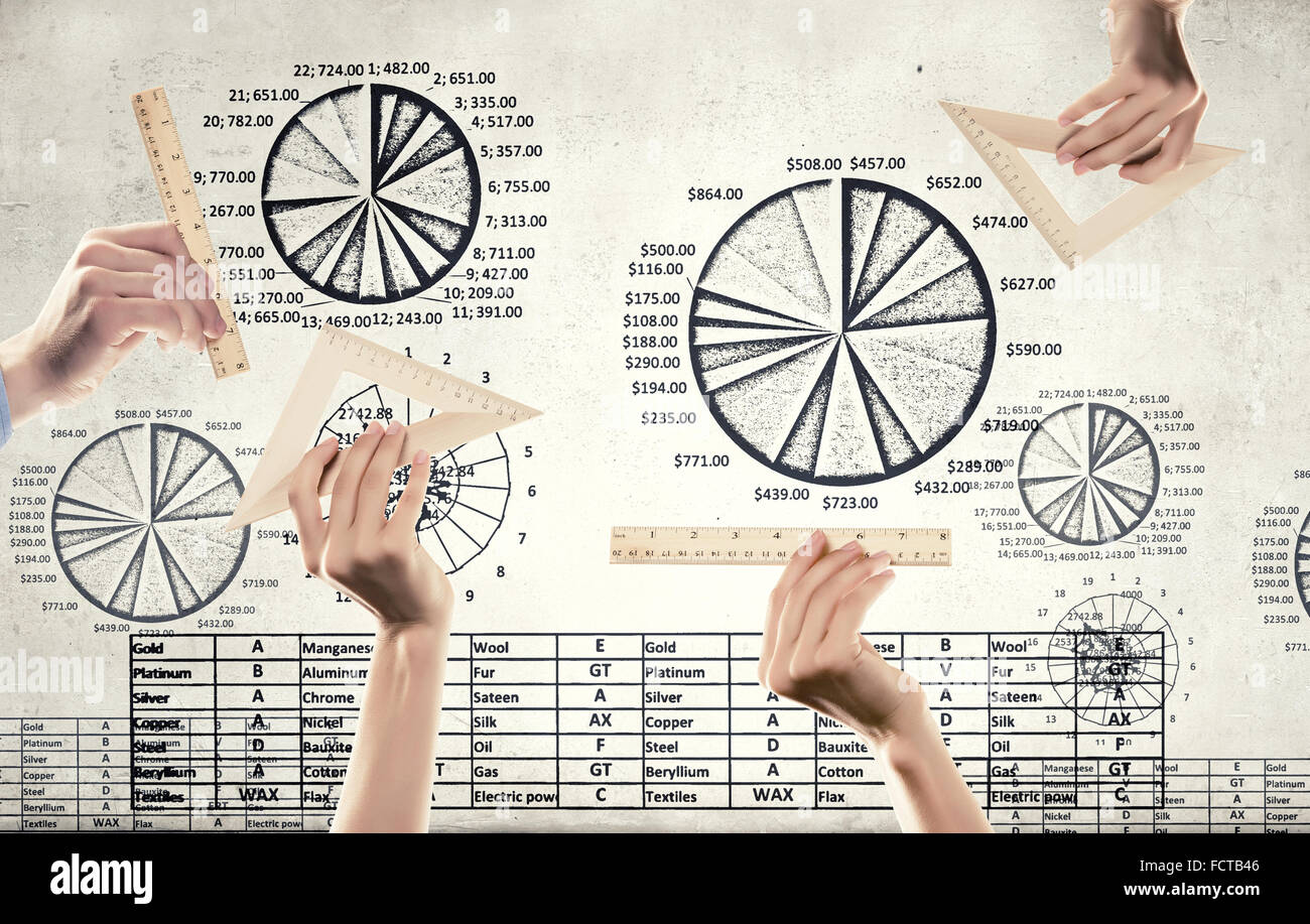 Close up of hand measuring diagrams with ruler Stock Photo - Alamy