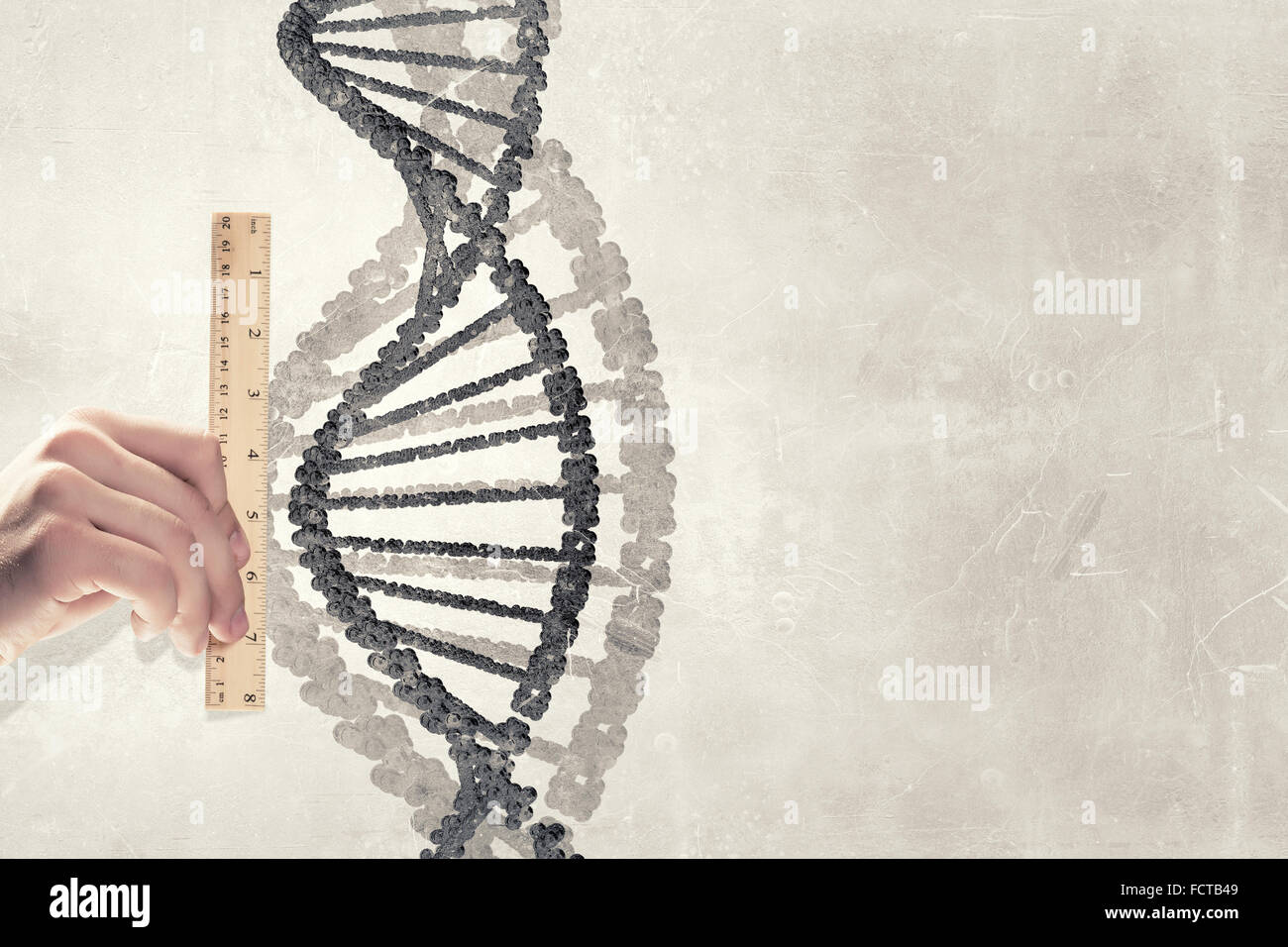 Close up of male hand measuring DNA molecule with ruler Stock Photo - Alamy