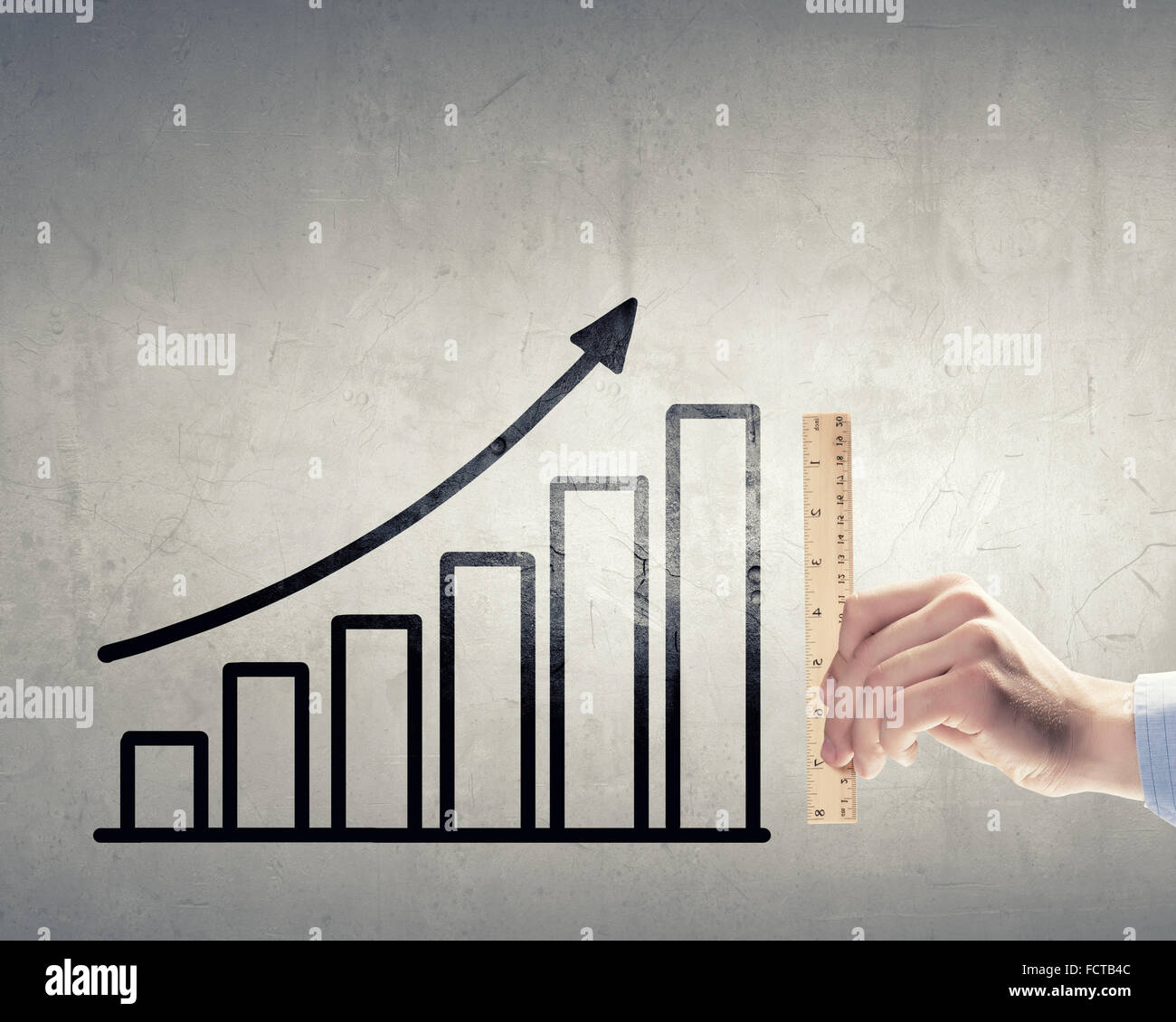 Close up of hand measuring growing graph with ruler Stock Photo - Alamy