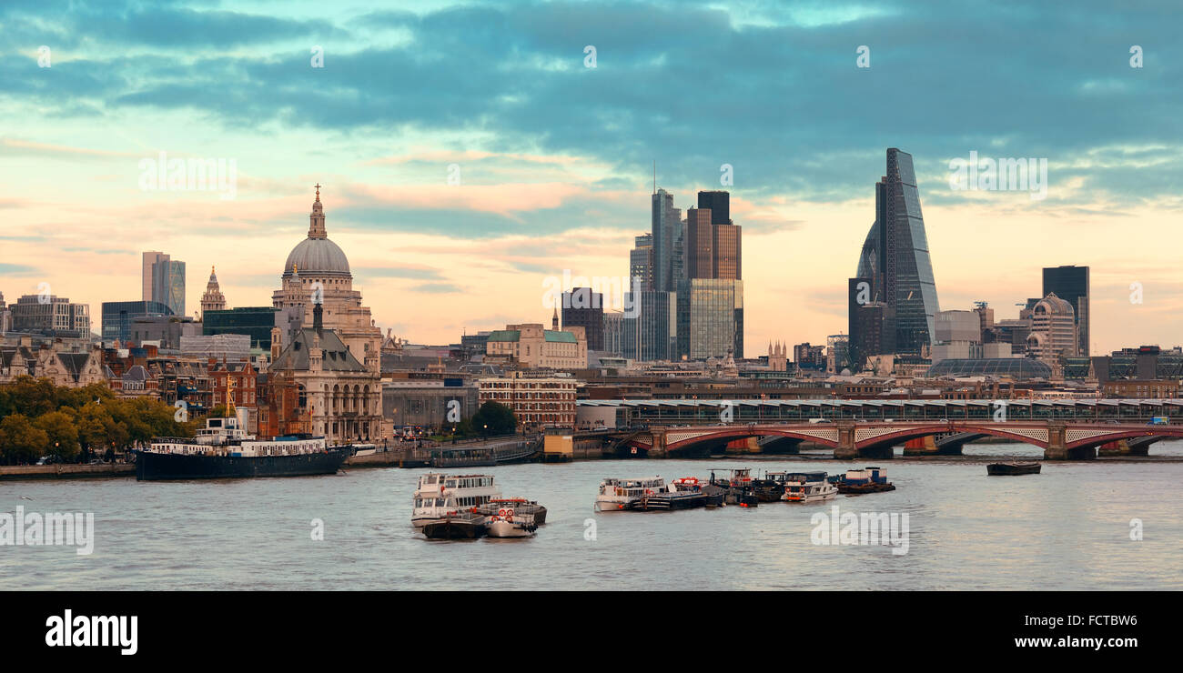 London cityscape at sunset panorama with urban buildings over Thames ...