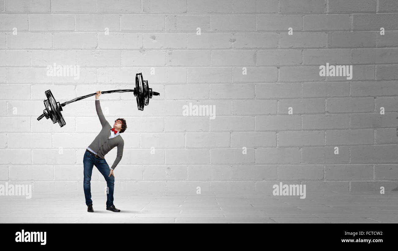 Confident man lifting above head sketched barbell Stock Photo - Alamy