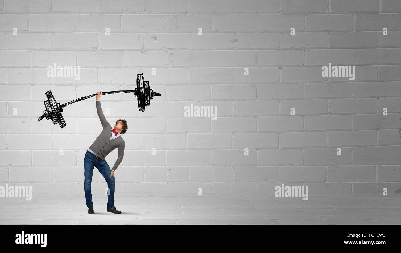 Confident man lifting above hi-res stock photography and images - Alamy