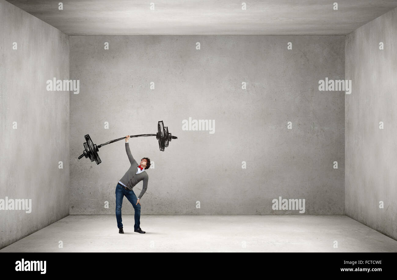 Confident man lifting above hi-res stock photography and images - Alamy