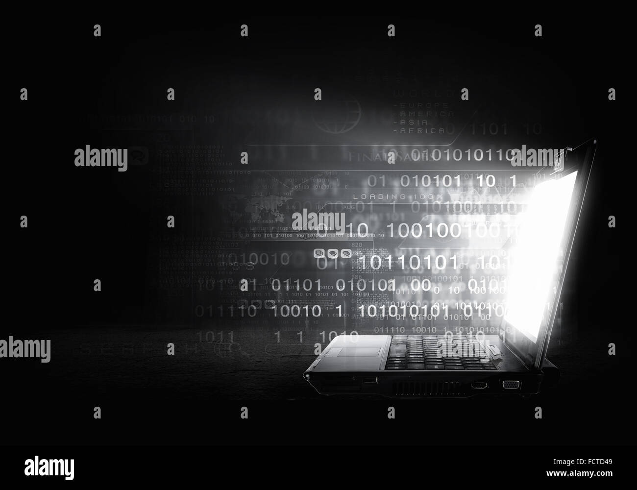 Open laptop with light coming from screen on dark background Stock ...