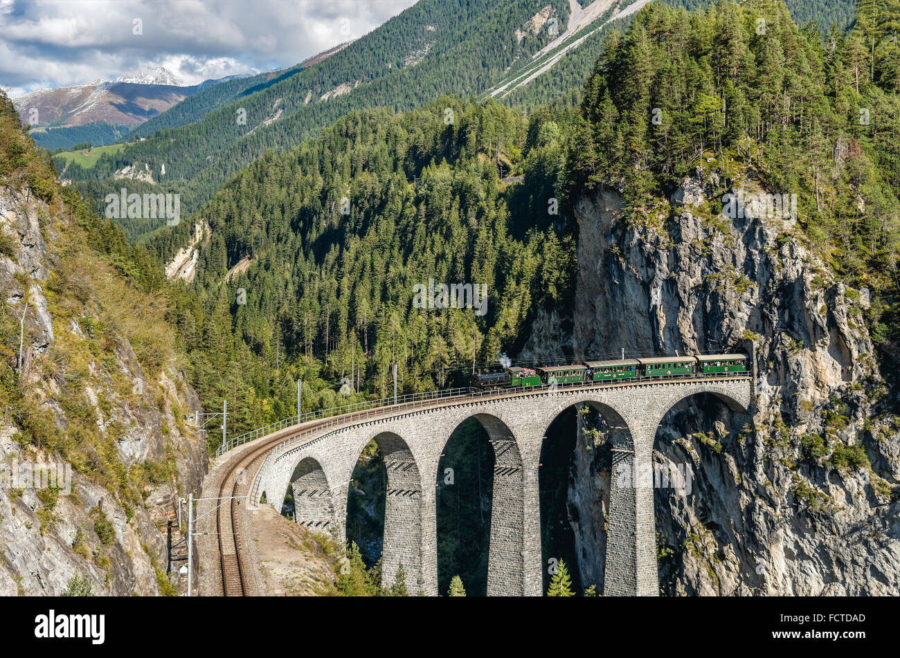Historical steam train at Landwasser Viaduct, Grisons, Switzerland ...