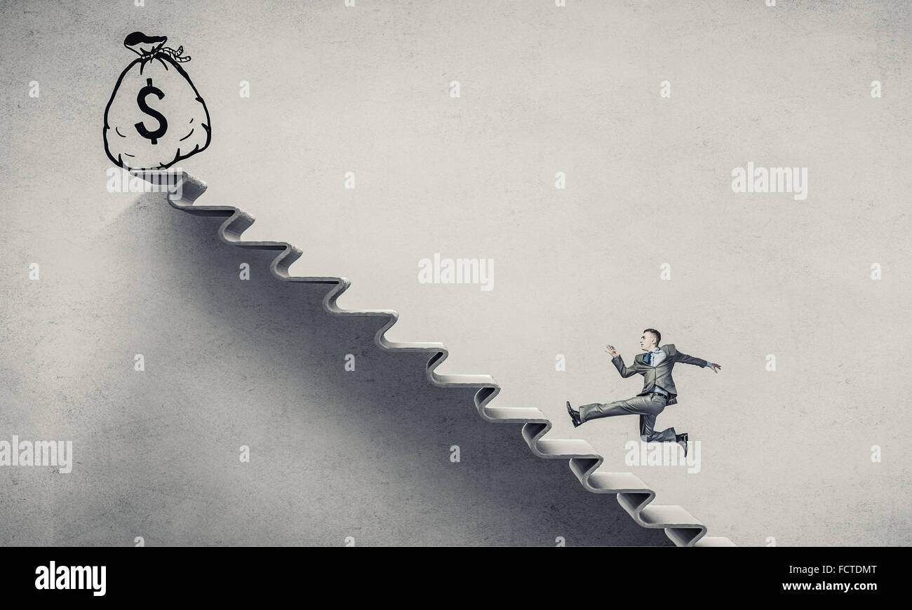 Young businessman running up on staircase with money bag on top Stock ...