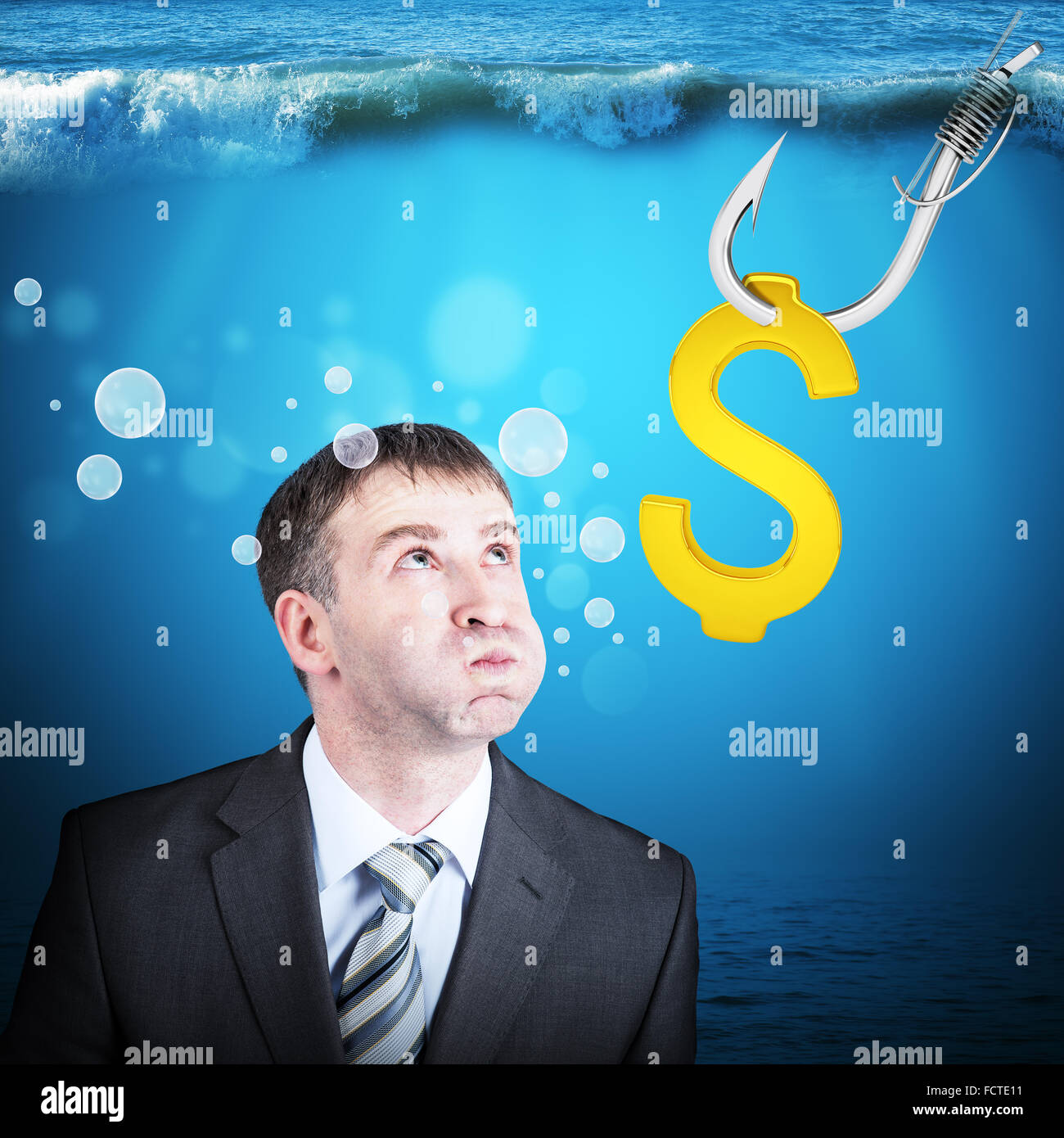 Businessman with inflated cheeks under water Stock Photo - Alamy