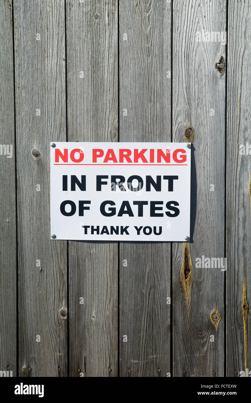 No Parking in Front of Gates sign Stock Photo - Alamy