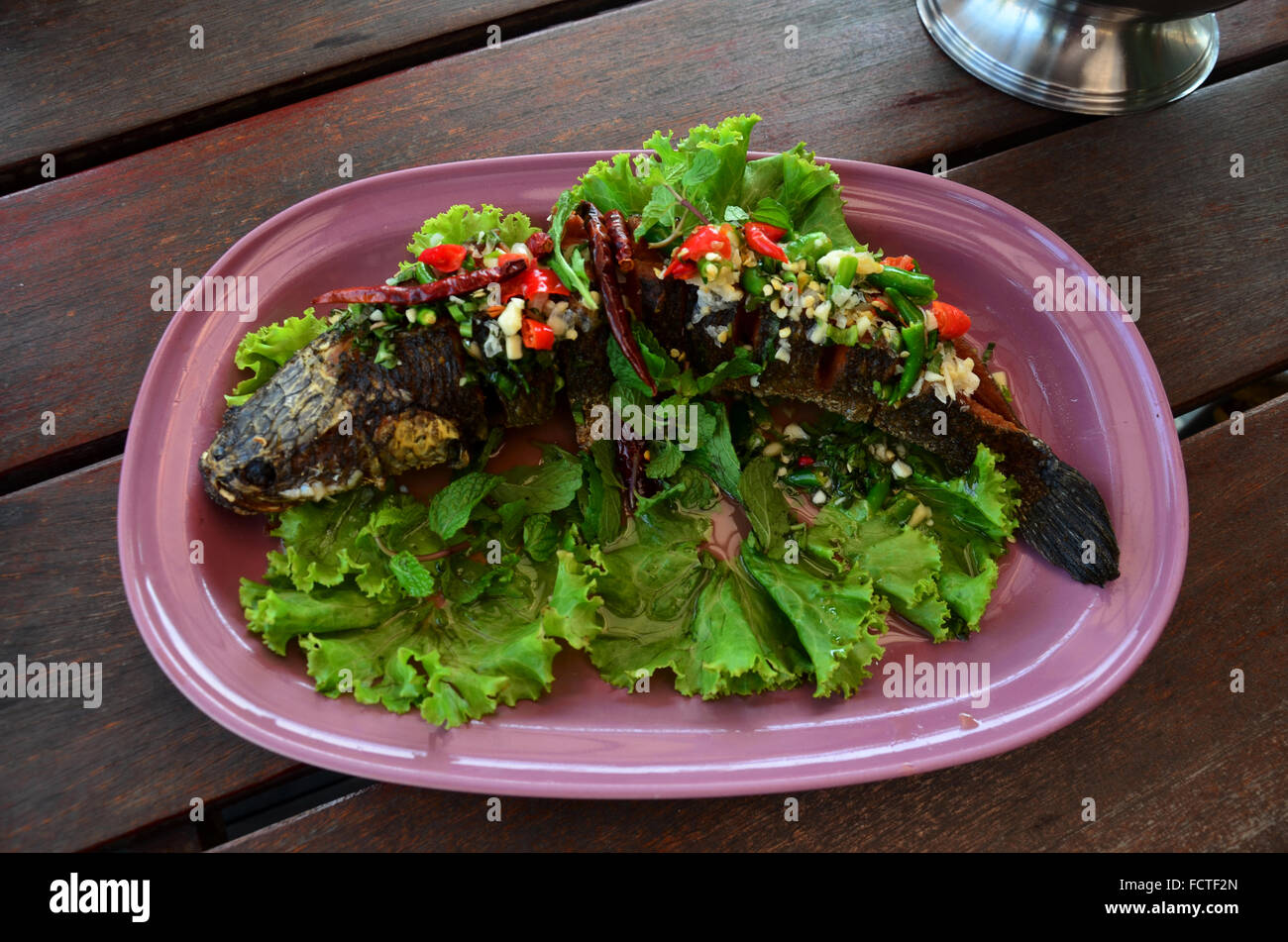 Snake-head fish Deep Fried serve with Herb and Spicy Sauce at ...