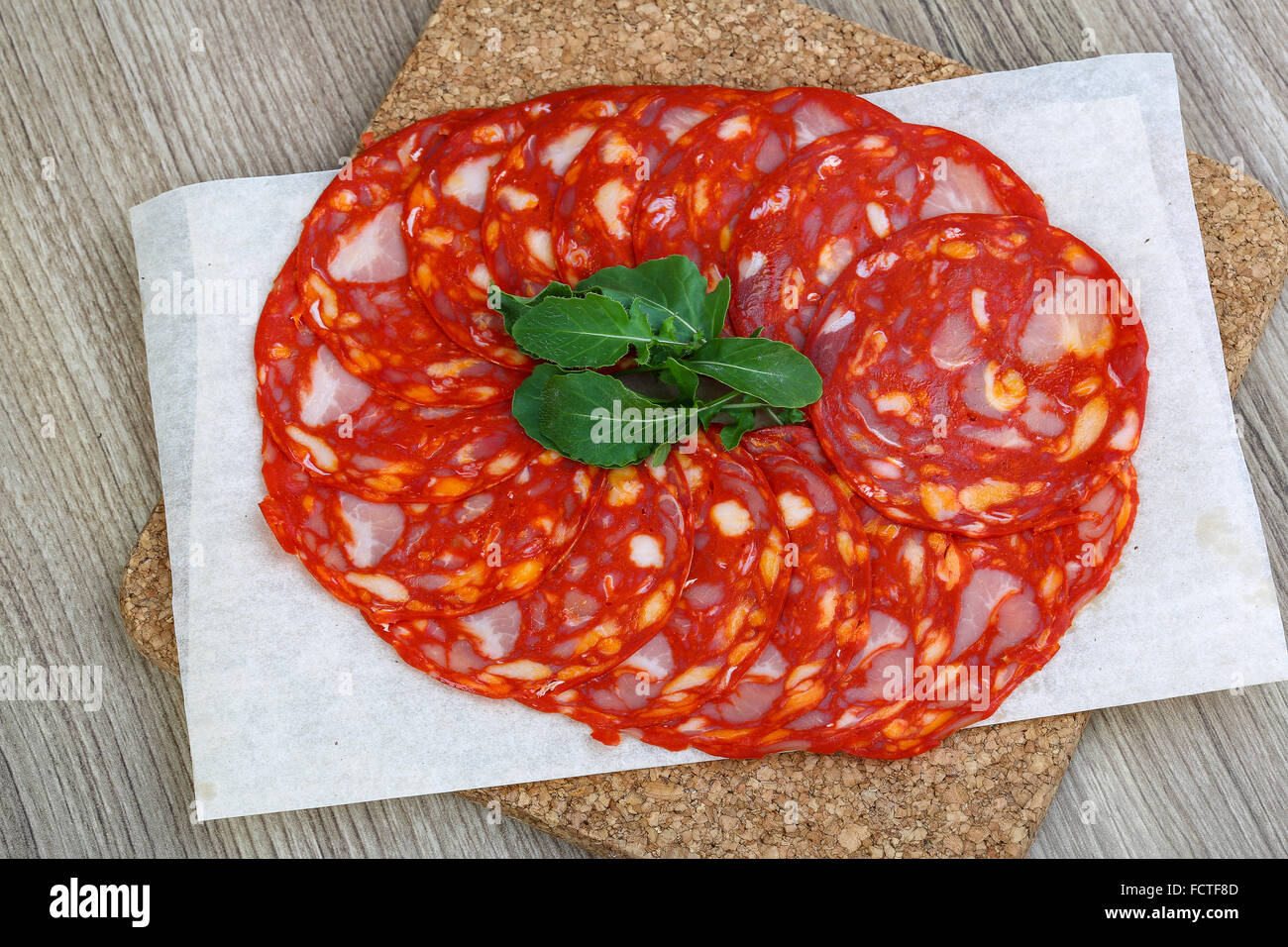 Traditional Spanish salami - Chorizo sausage on the wood background ...