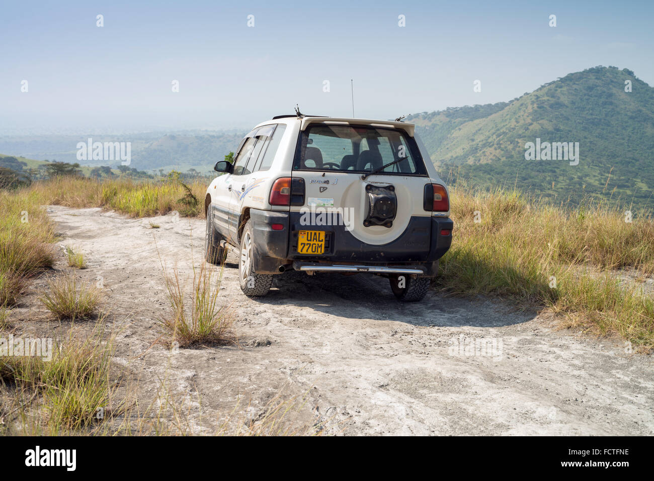 4x4 tourist vehicle in landscape in Queen Elizabeth National Park ...