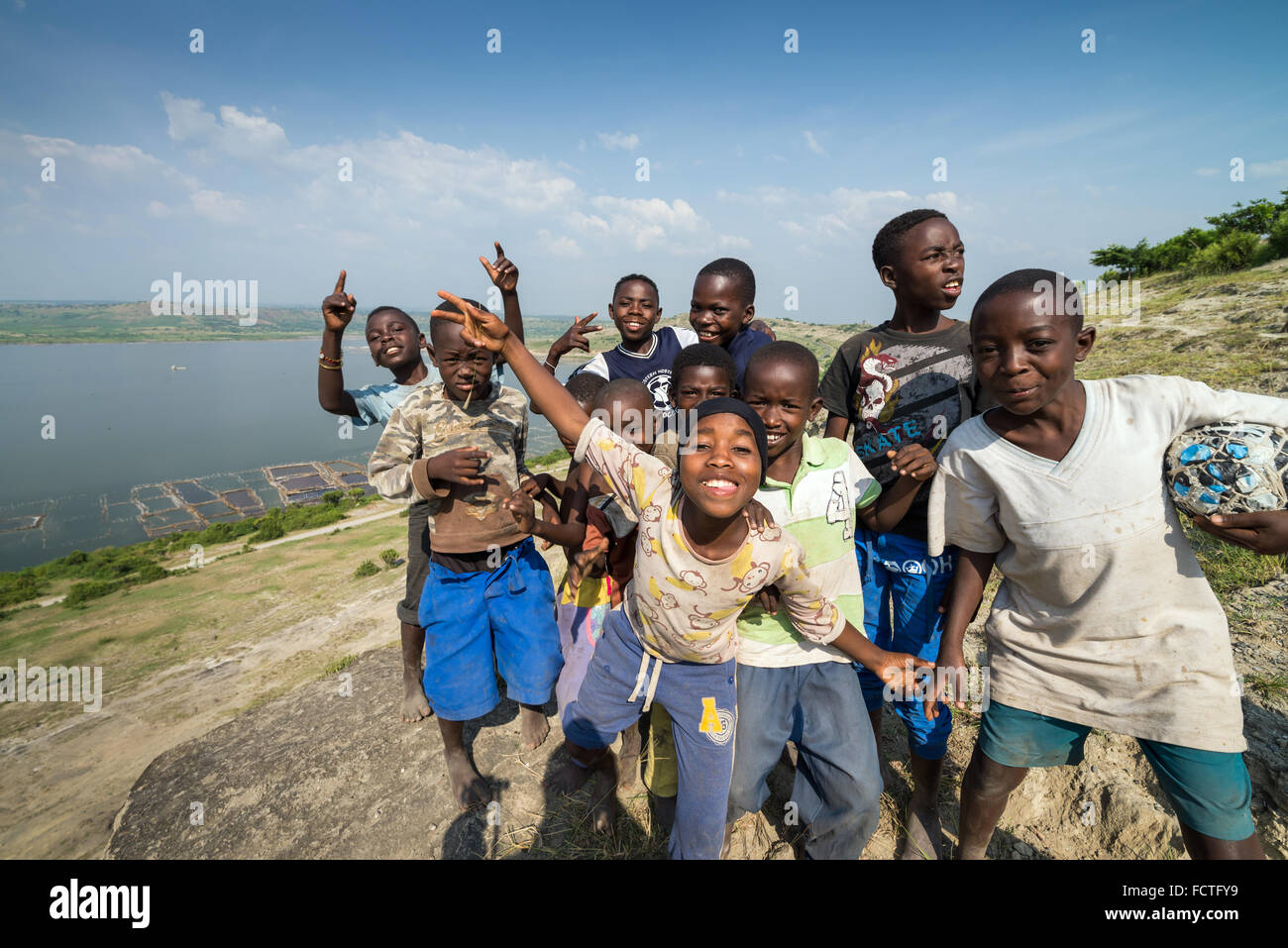 Happy children and Katwe Crater Lake, Queen Elizabeth National Park ...