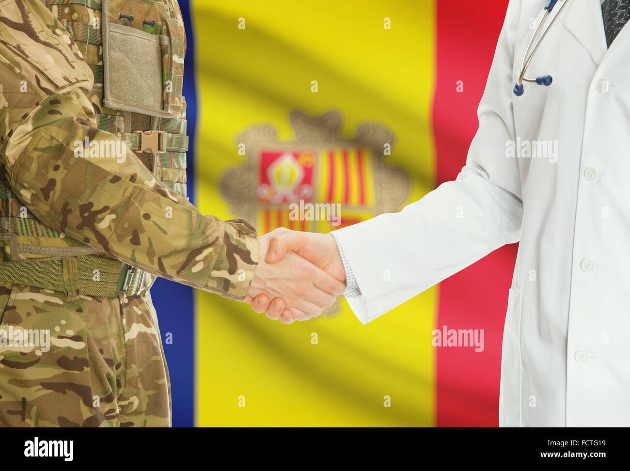Soldier in uniform and doctor shaking hands with national flag on ...