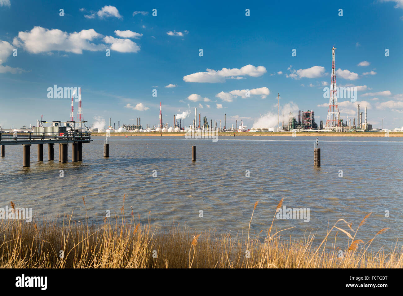 A large refinery with gas storage tanks in the port of Antwerp, Belgium ...