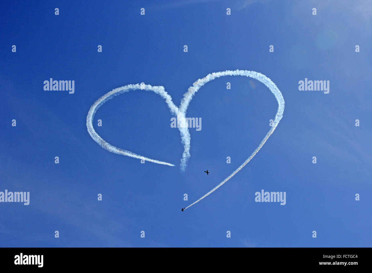Vintage Aircraft Sky Writing Romantic Heart Shape Stock Photo - Alamy