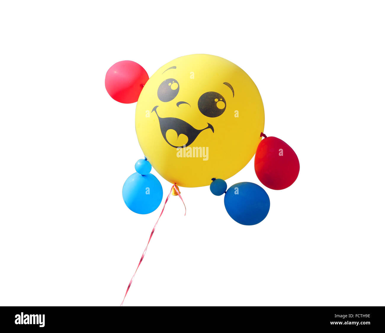 Yellow balloon flying on a white background Stock Photo - Alamy
