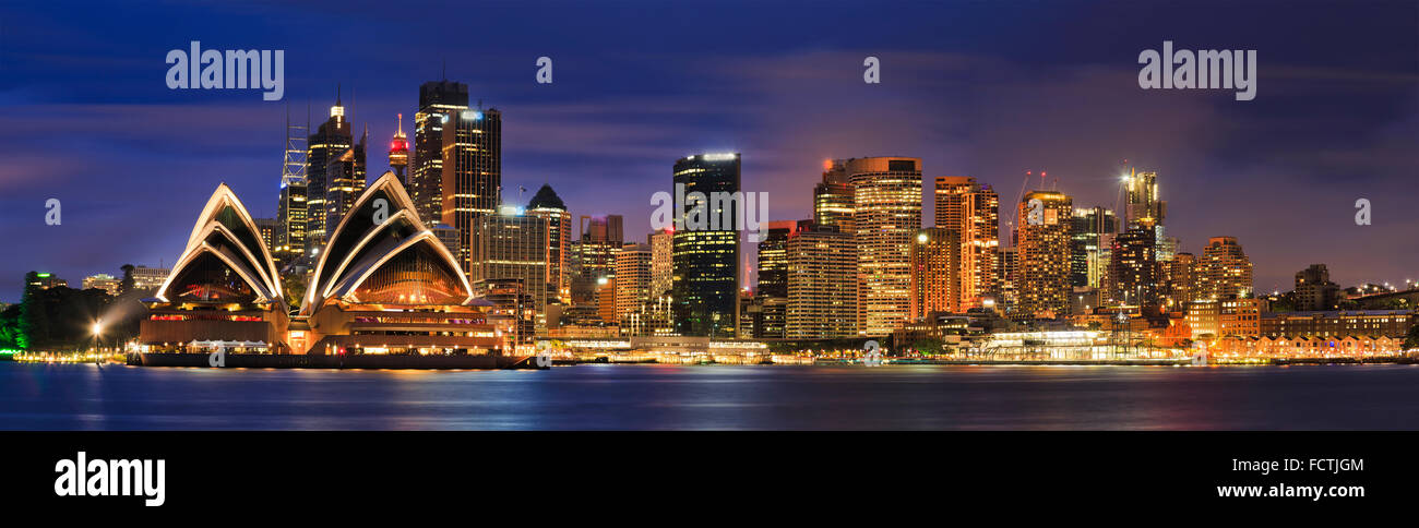 Main australian city Sydney at sunset across Harbour brightly ...