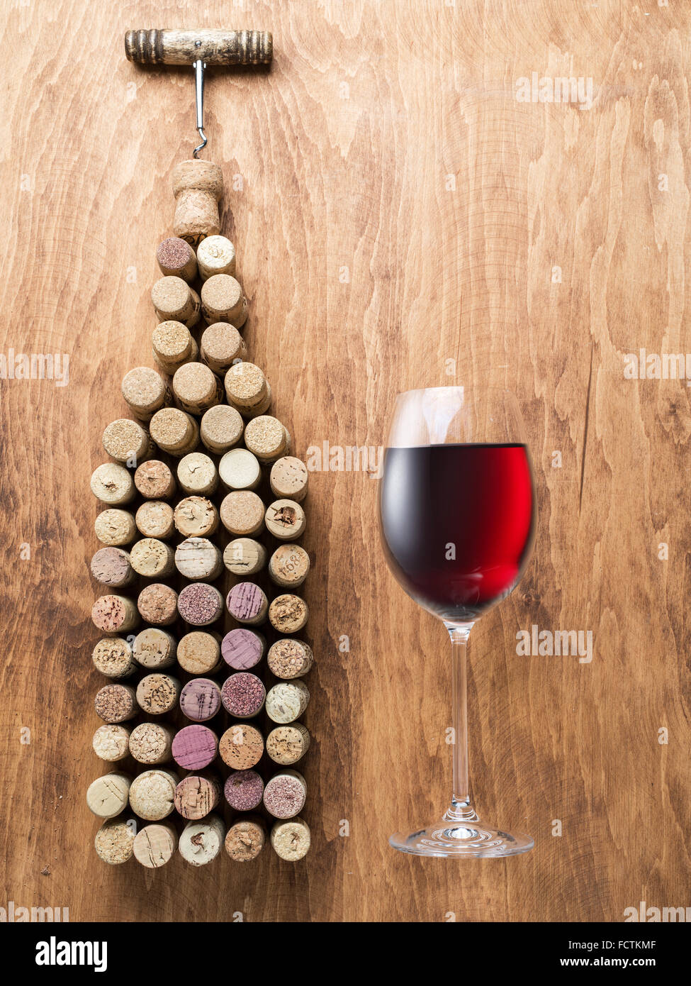 Wine corks in the shape of wine bottle on the wooden background Stock ...
