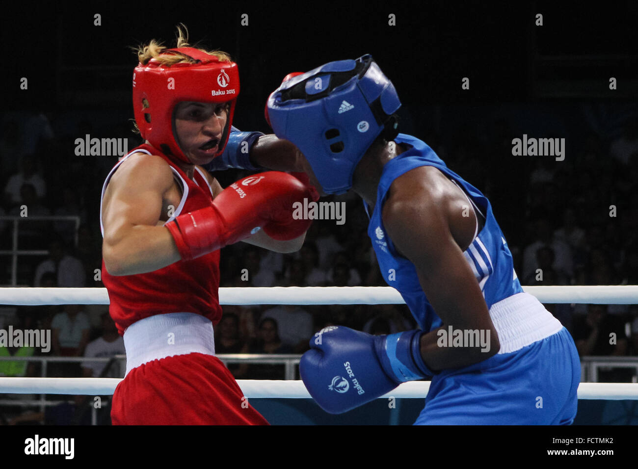 Nicola Adams (GBR, blue) and Stoyka Petrova (BUL, red). Women's Fly (48 ...