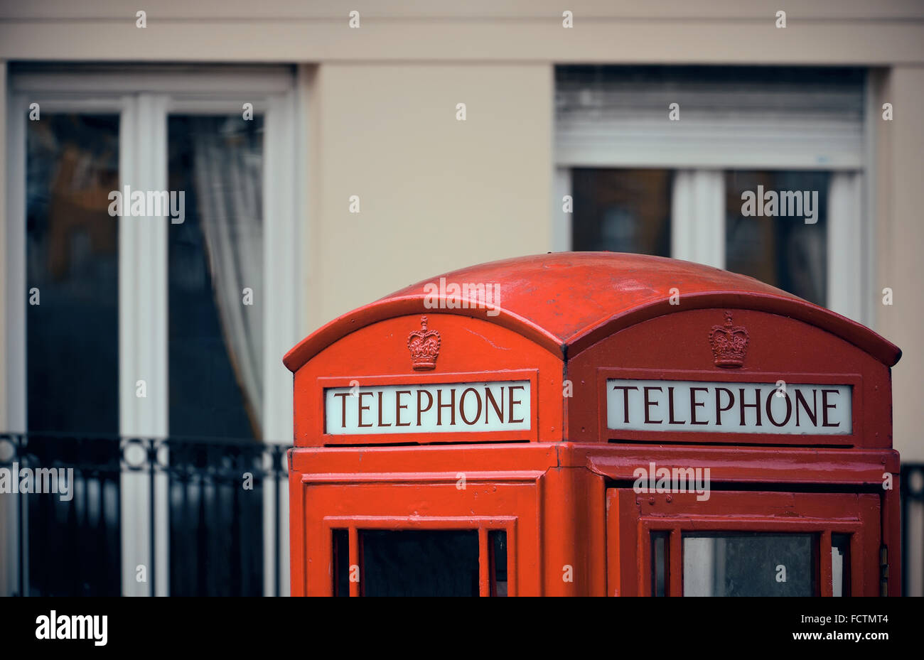 Red telephone booth and mail box in street in London as the famous ...