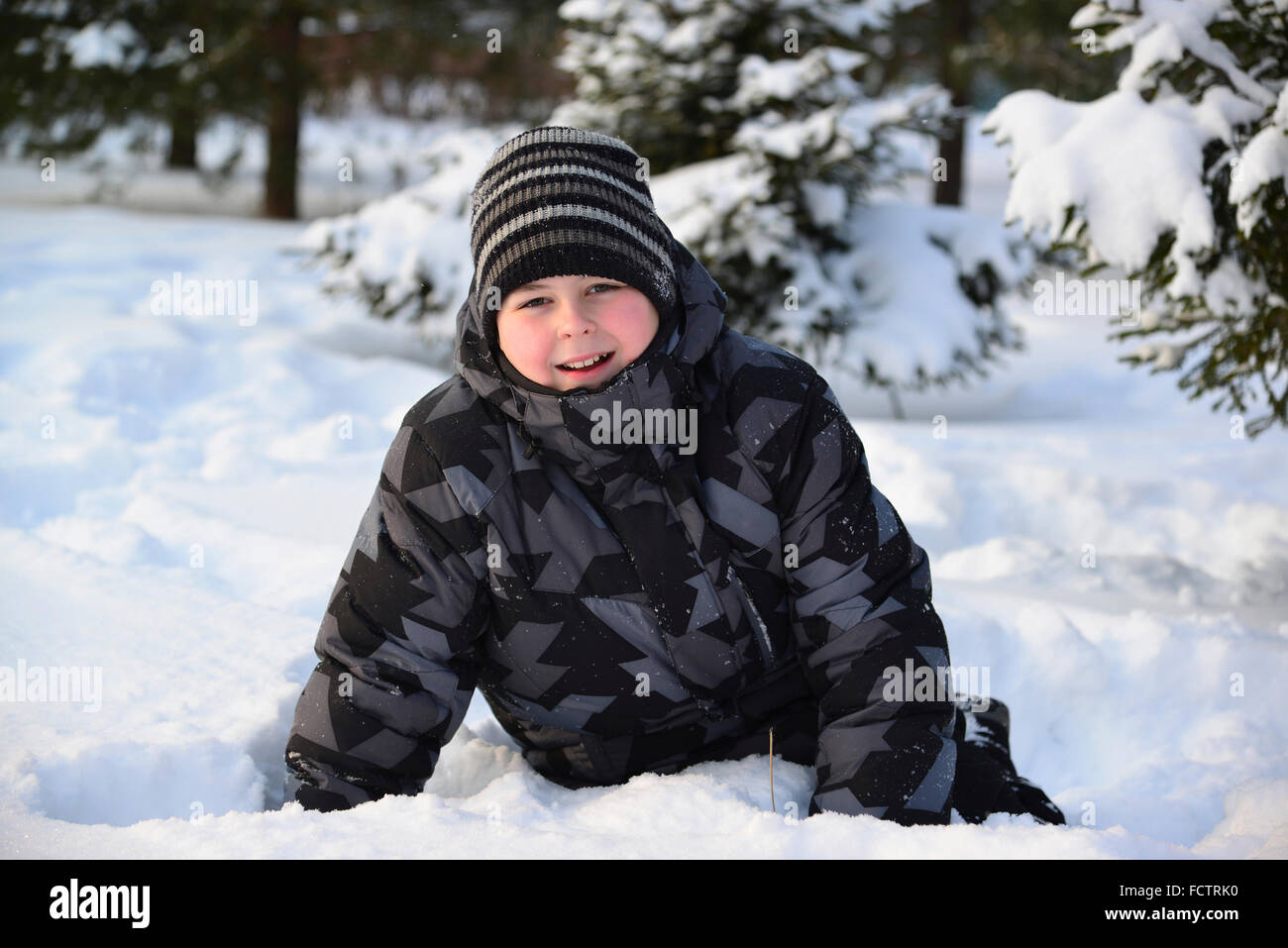 Teen boy smile snow hi-res stock photography and images - Alamy