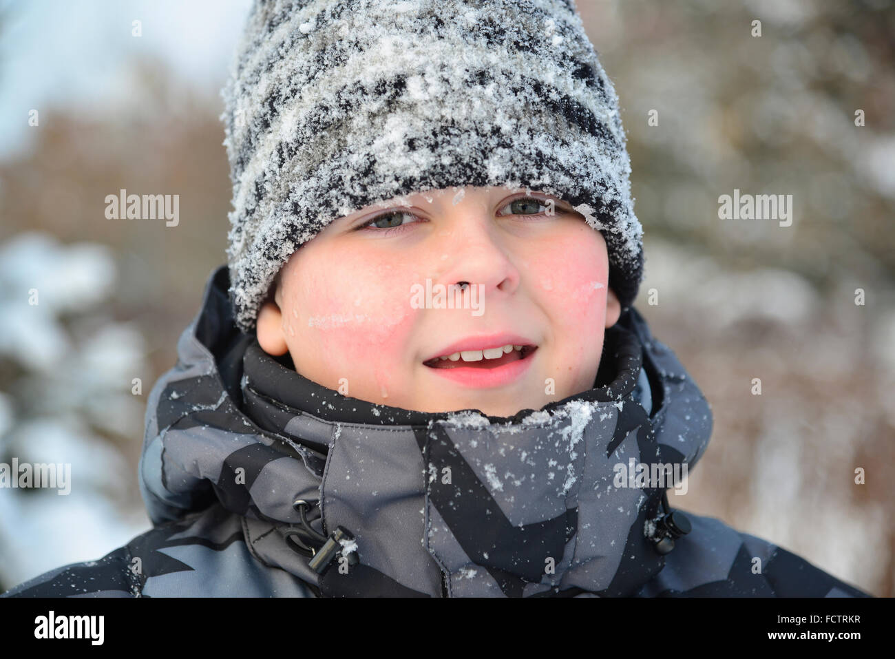Portrait of frozen boy in winter Stock Photo - Alamy