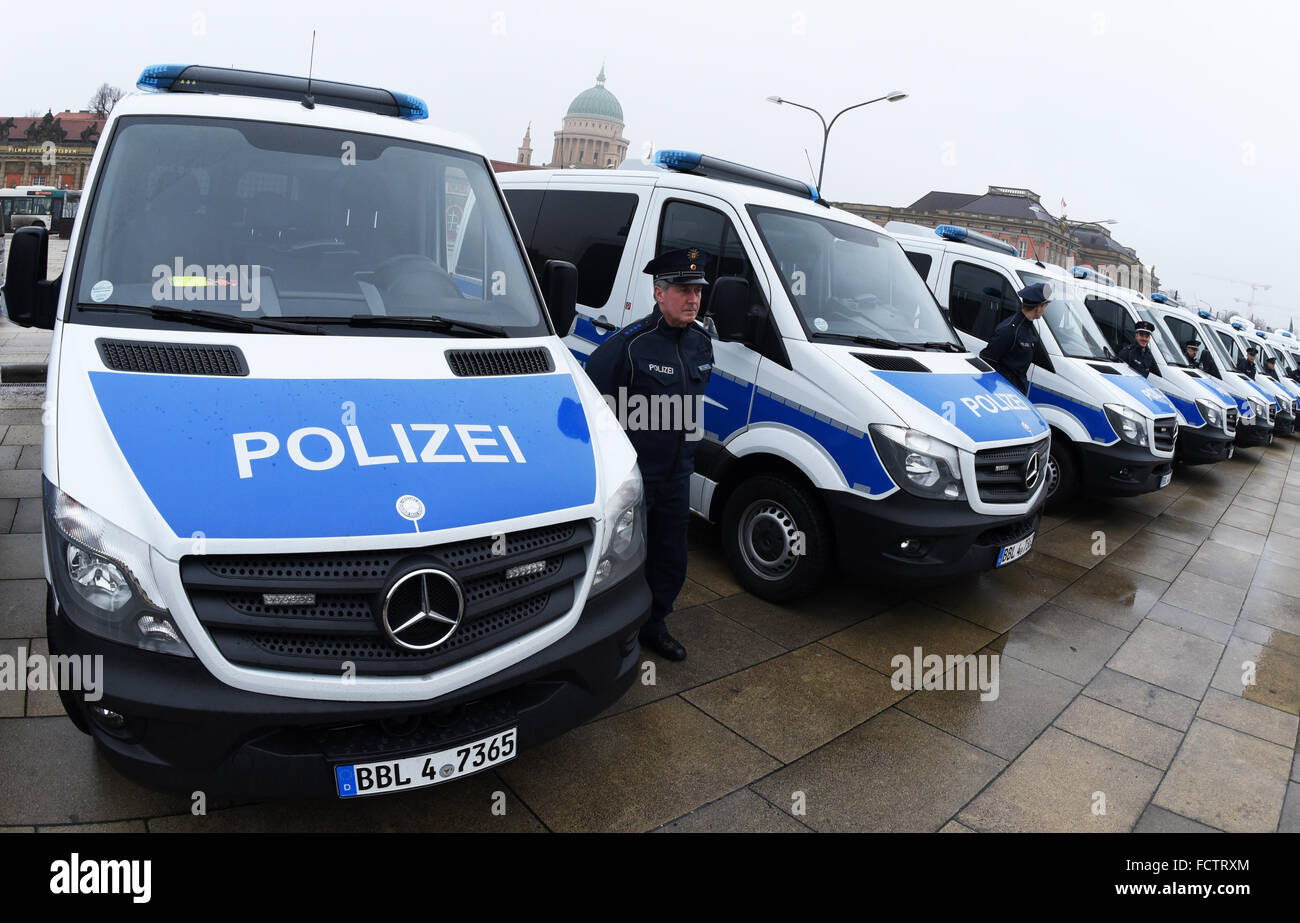 Potsdam, Germany. 25th Jan, 2016. Police officers line up next to their ...