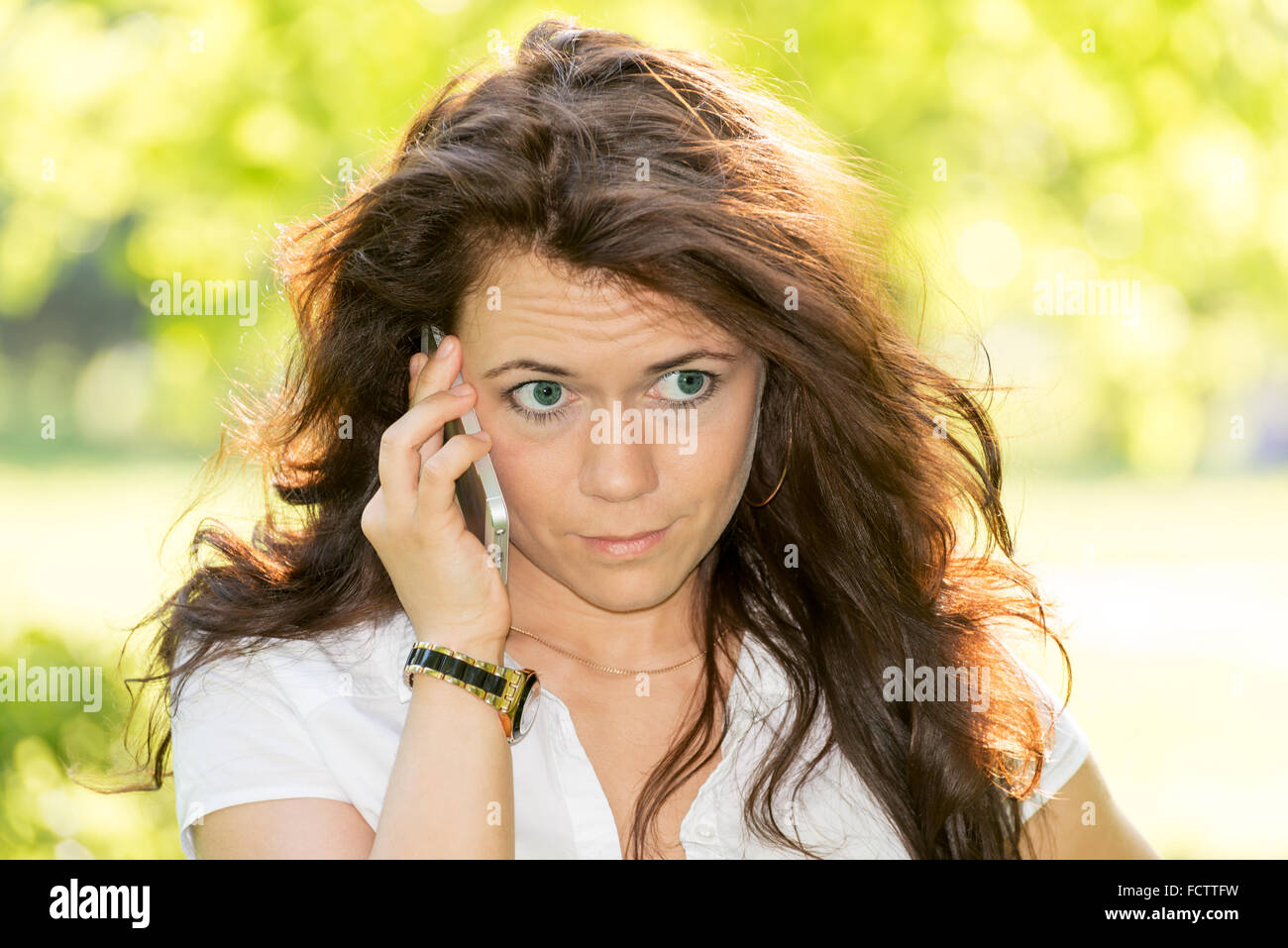 Girl talking on cell phone Stock Photo - Alamy
