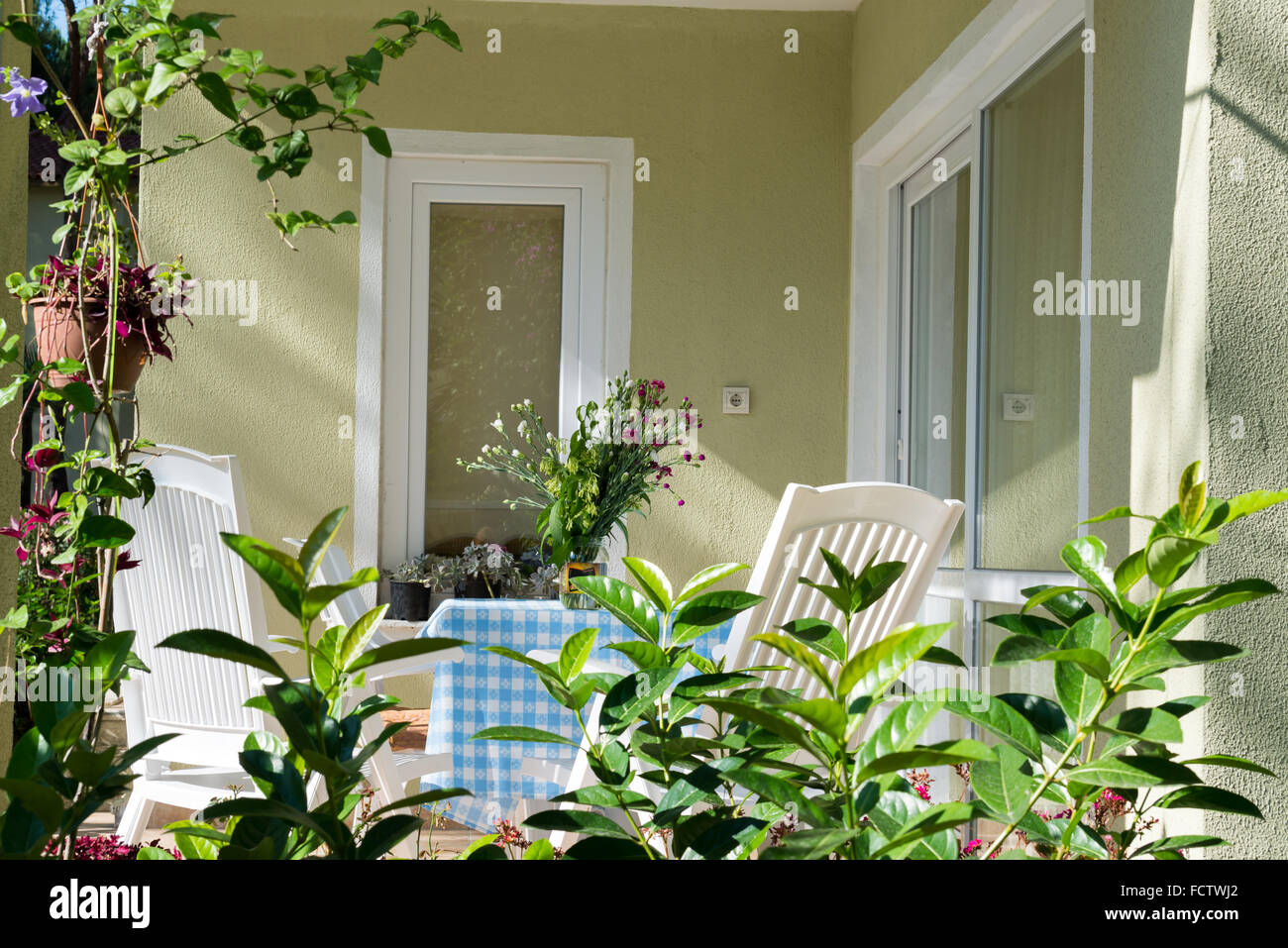 White garden furniture on the terrace Stock Photo - Alamy