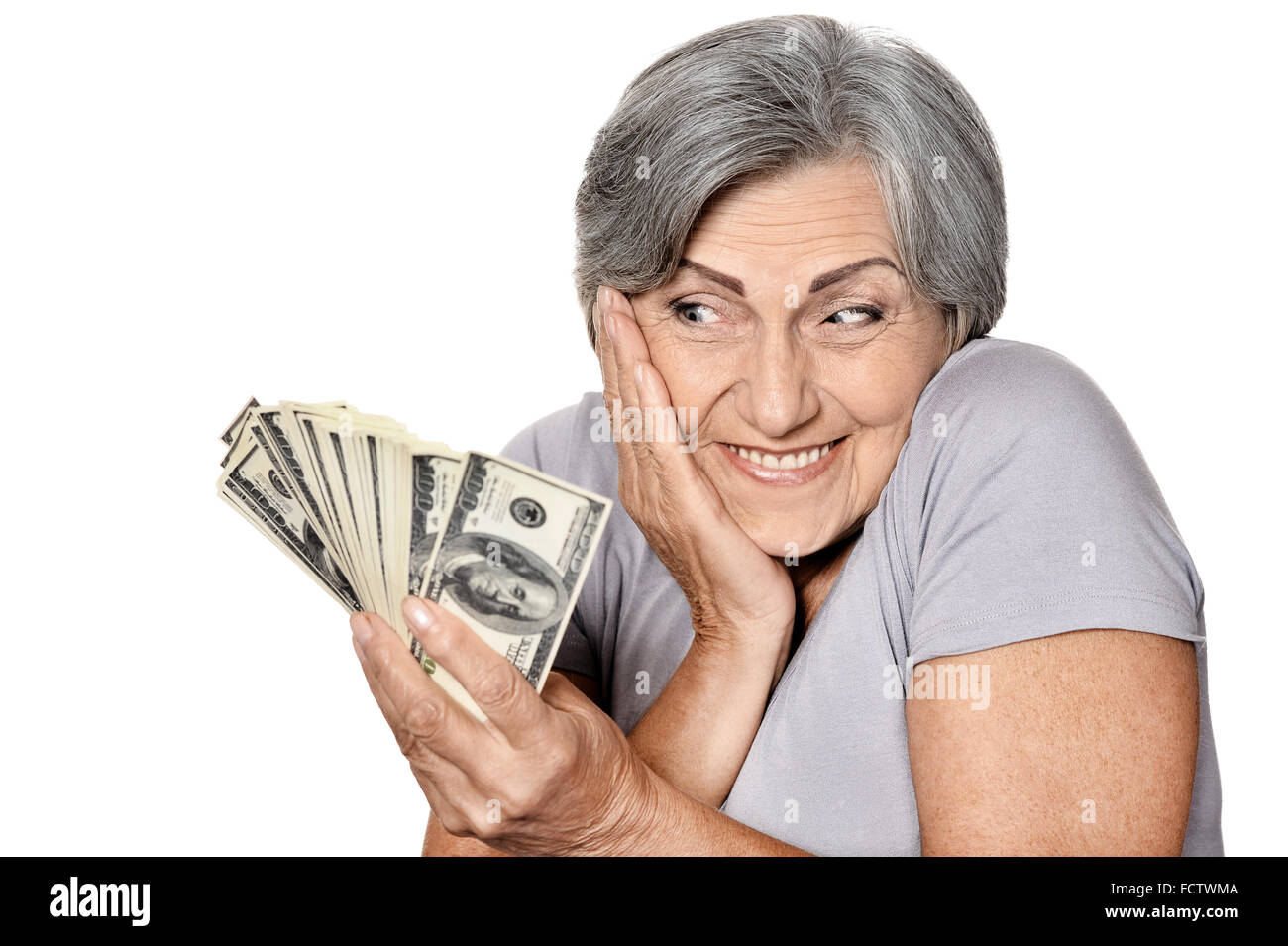 Senior woman with money Stock Photo - Alamy