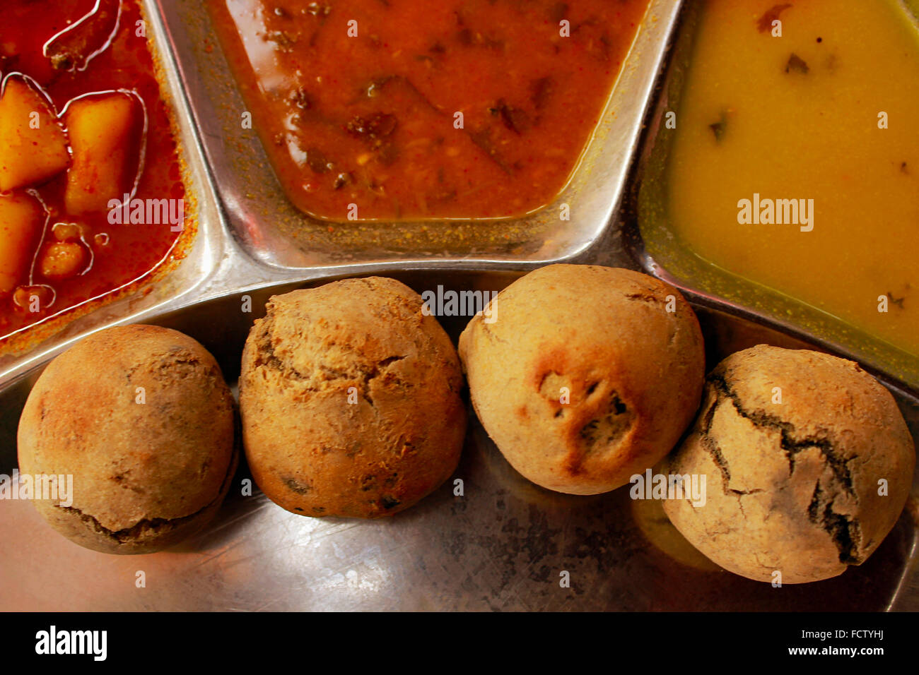 Traditional Rajasthani food dal-bati and Kurma, Pushkar fair, Rajasthan ...