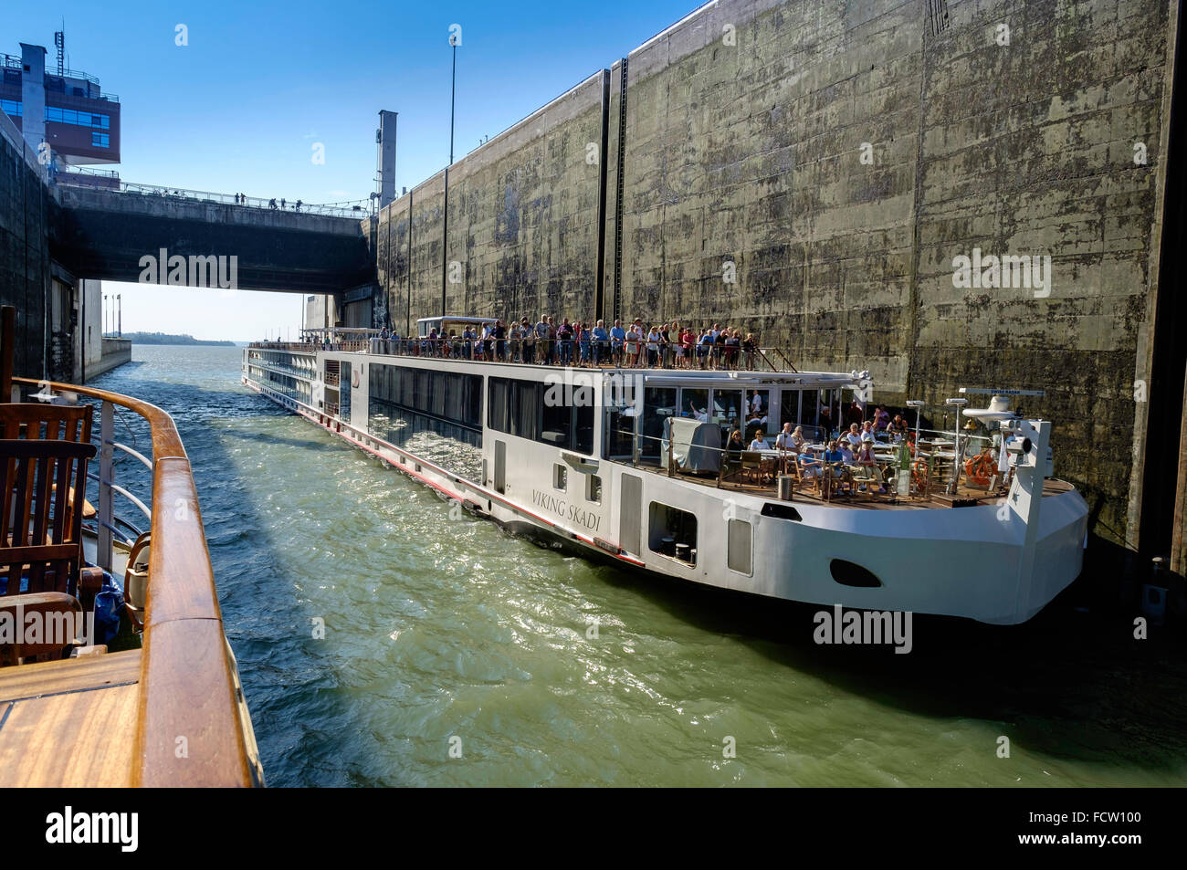 GABCIKOVO LOCK ON RIVER DANUBE IN SLOVAKIA WITH CRUISE BOATS WAITING TO ...